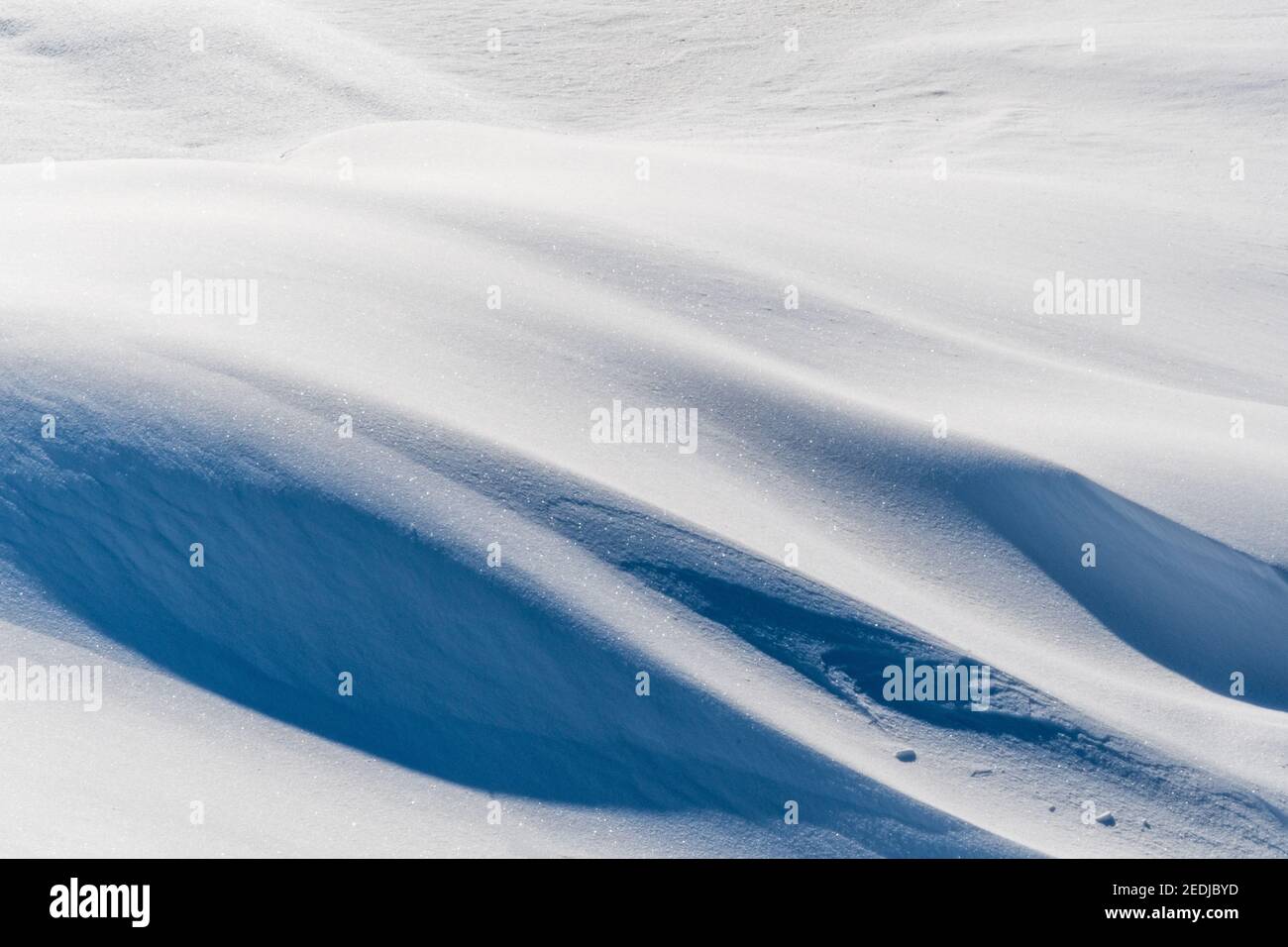 Textured snowdrift background image Stock Photo - Alamy