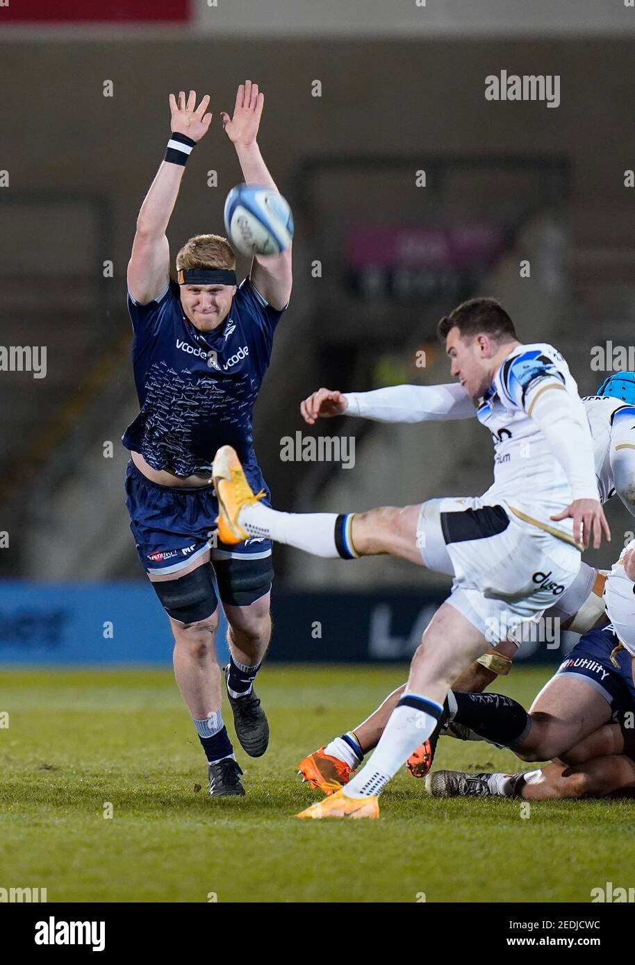 Sale Sharks Matt Postlethwaite stretches as he tries to charge down a ...