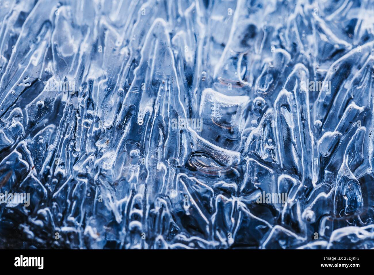 Blue azure ice crystals close up - close-up winter theme - ice crust in ...