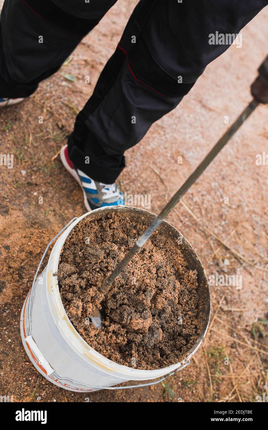 Cement mortar for bonding concrete blocks in the construction of a ...