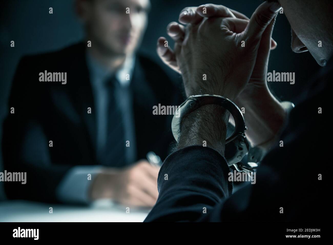 Prison officer in handcuffs hi-res stock photography and images - Alamy