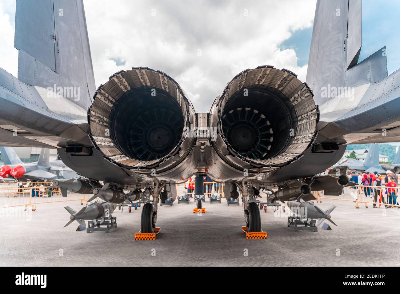 Back view of the giant powerful round engines of a military fighter jet ...