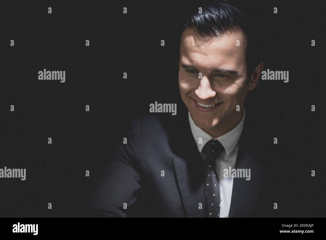 Man in shadow smiling hi-res stock photography and images - Alamy