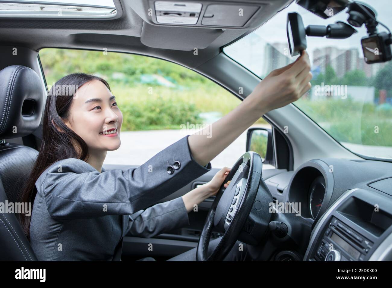 Adjusting the rear view mirror of a car hi-res stock photography and ...