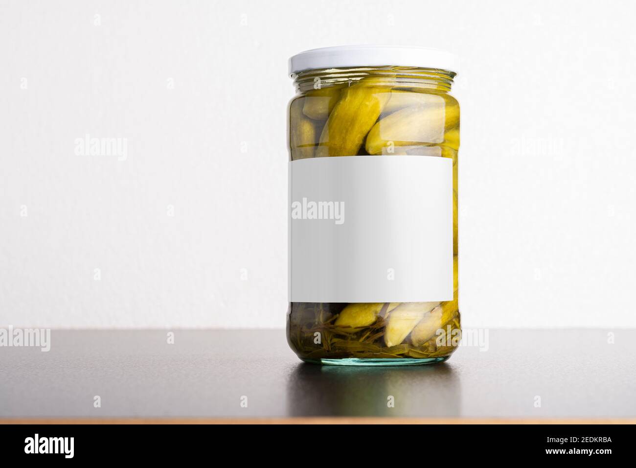 Pickled cucumber conserve with round cap, editable mock-up series ...