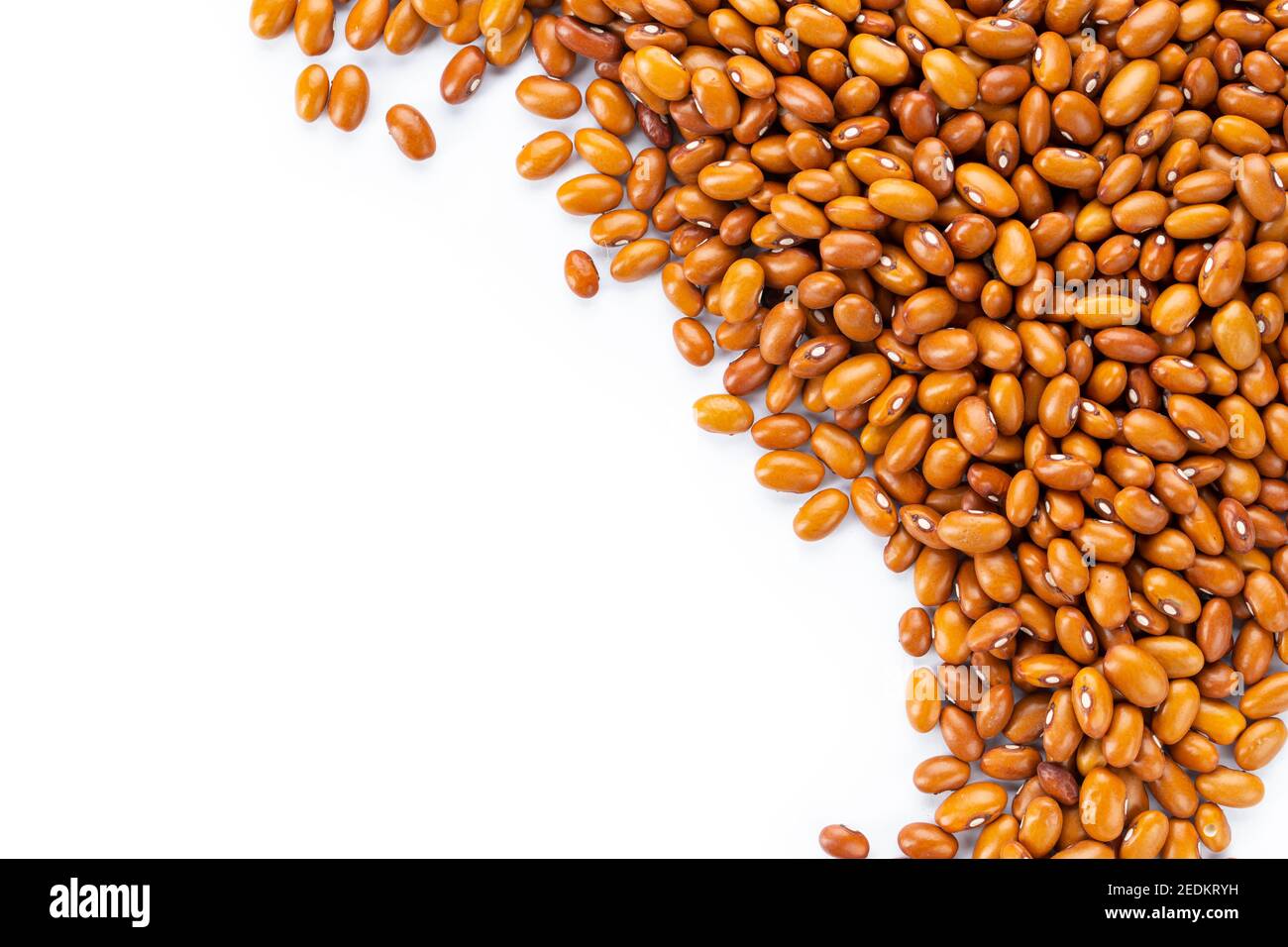Dried orange beans on a white plate. Healthy food concept Stock Photo ...