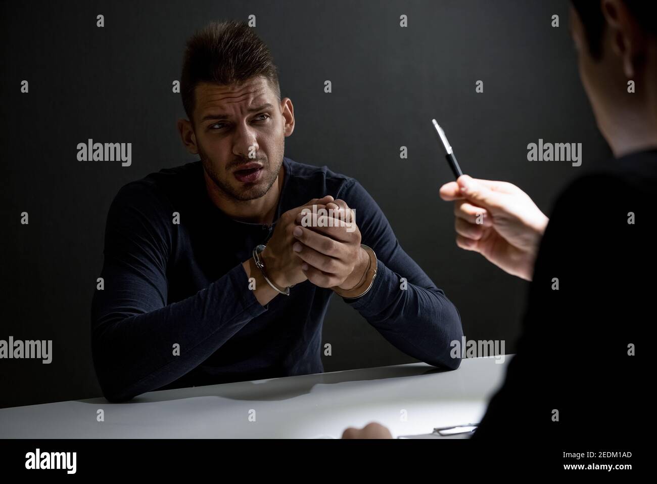 Suspect interview police hi-res stock photography and images - Alamy