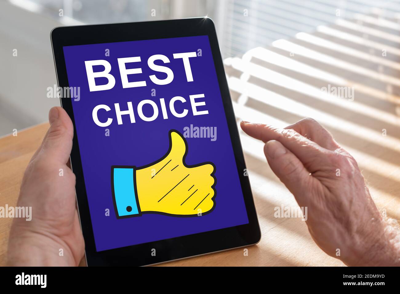 Tablet screen displaying a best choice concept Stock Photo - Alamy