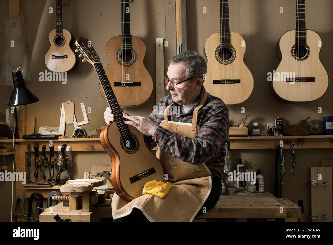 Welsh Guitar maker Paul Beauchamp working on a hand made acoustic ...