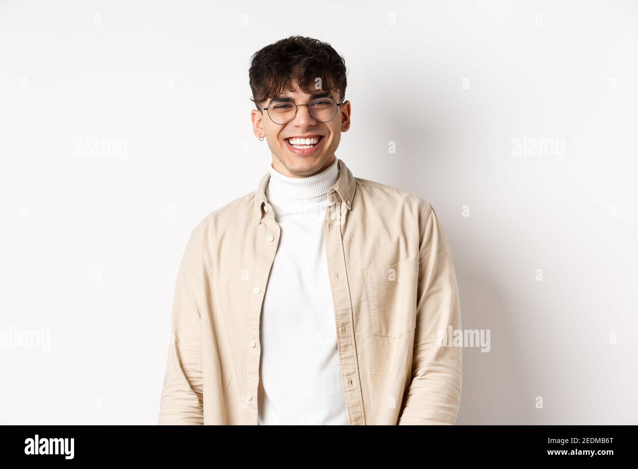 Real people. Natural portrait of happy guy smiling and laughing ...