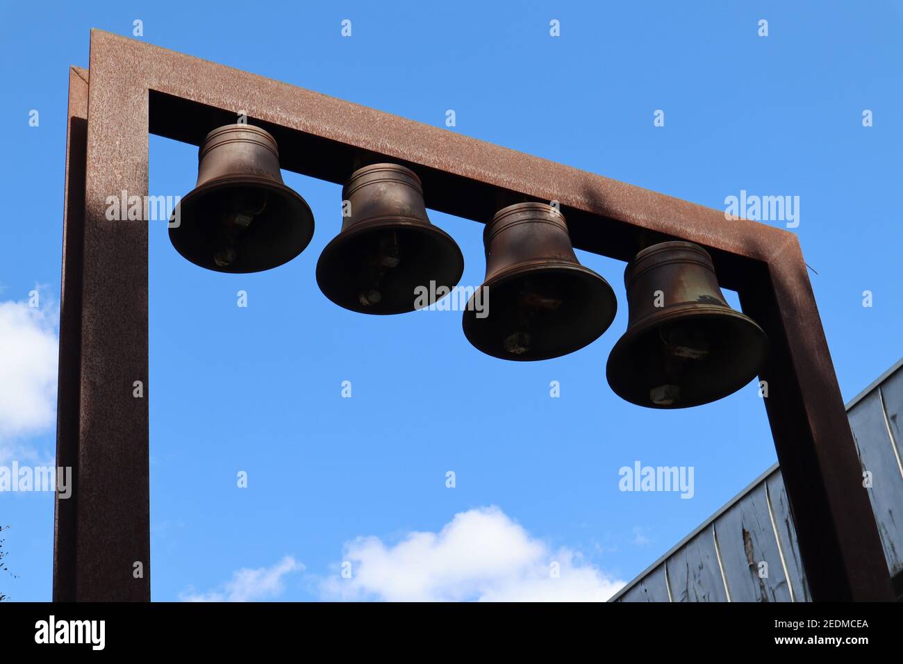 Four Church bells suspended on an iron frame Islington London Stock ...