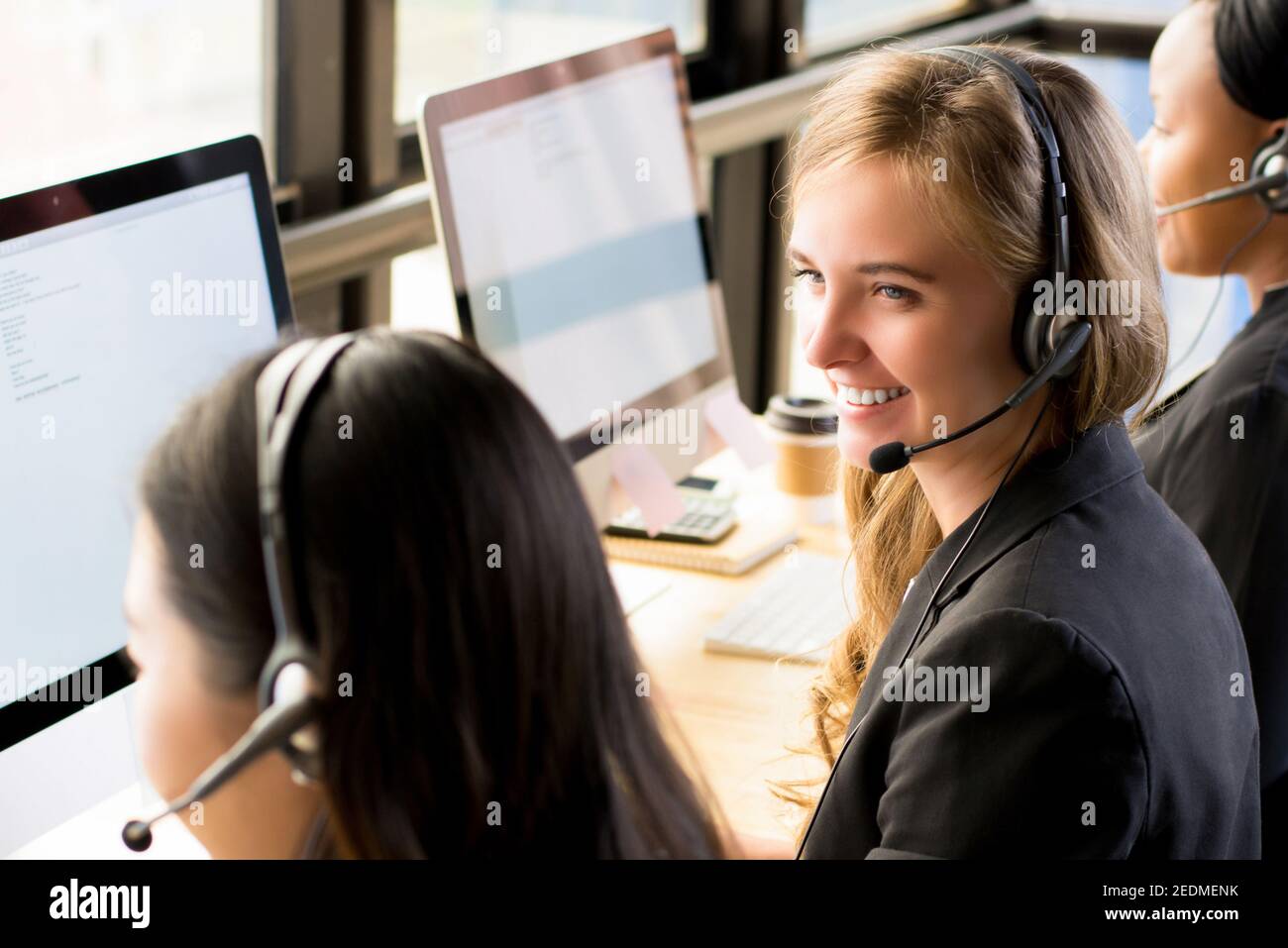 Beautiful young customer assistant hi-res stock photography and images ...