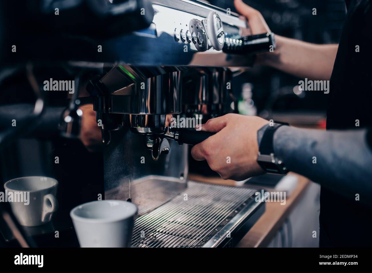 Barista hands at work - professional coffee machine in a cafe - making ...