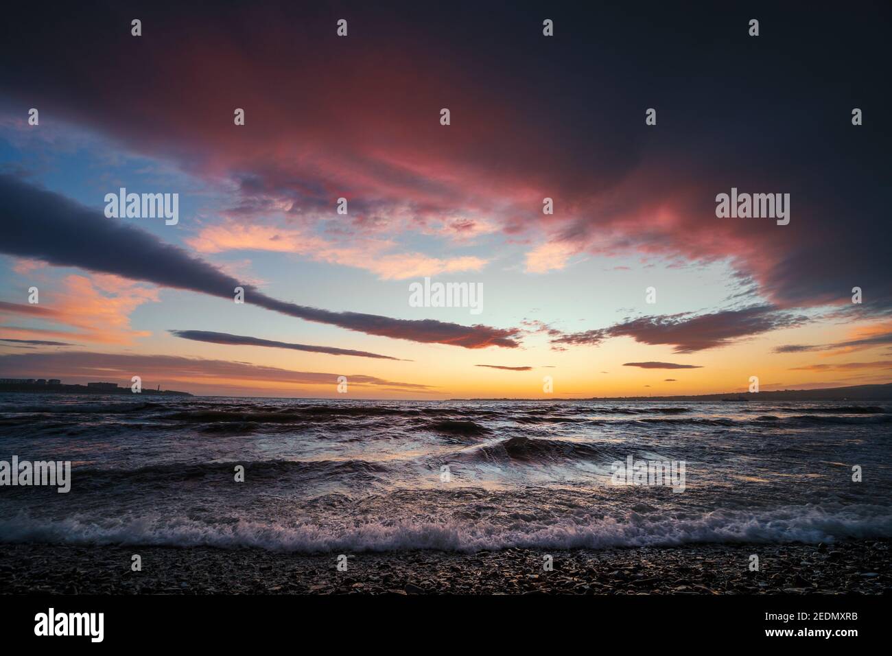 Sea sunset landscape of sun above ocean with clouds hi-res stock ...
