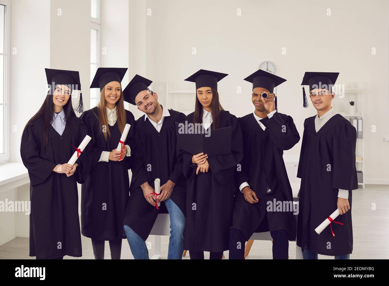 Cheerful students different nationalities hi-res stock photography and ...