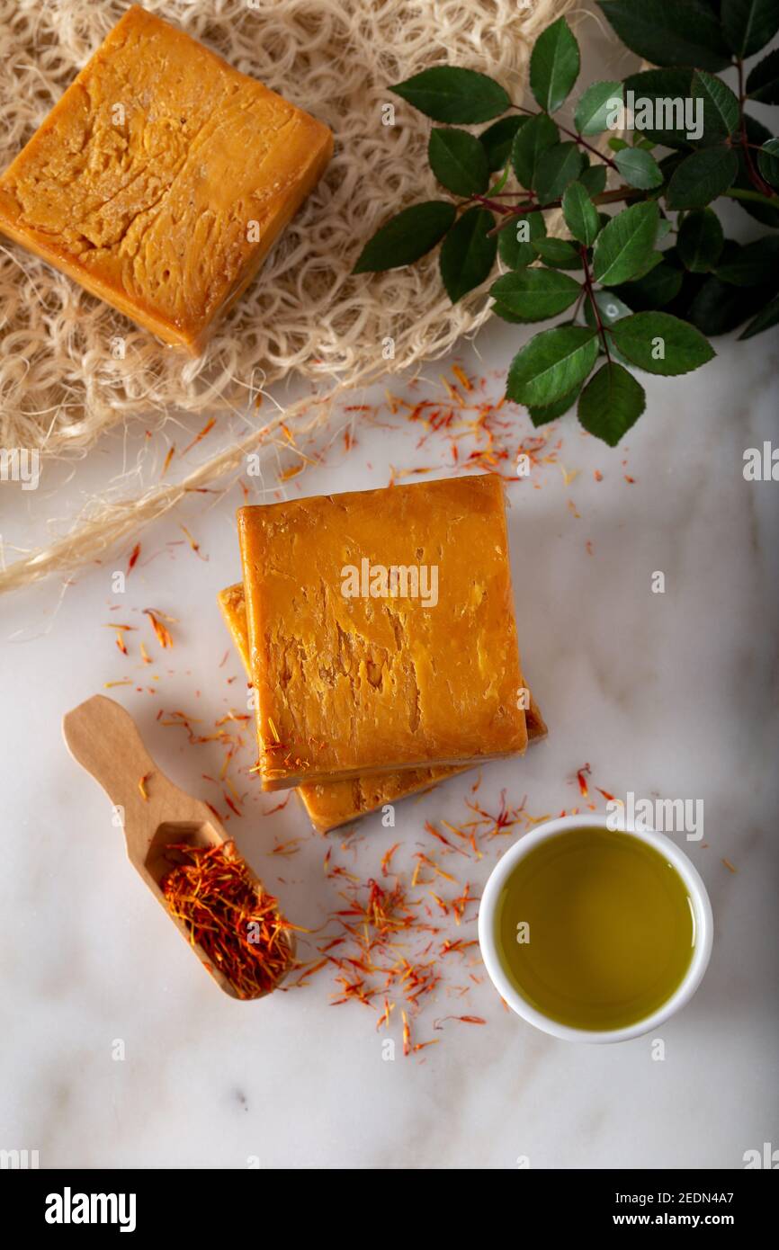 Handmade saffron soap with saffron spices threads on the marble Stock ...
