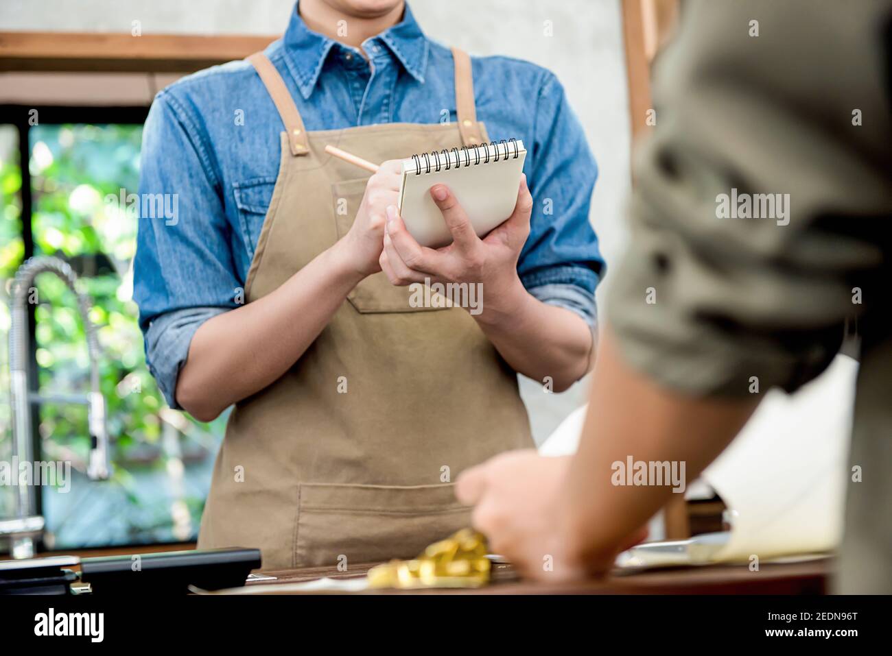 Casual restaurant waiter hi-res stock photography and images - Alamy