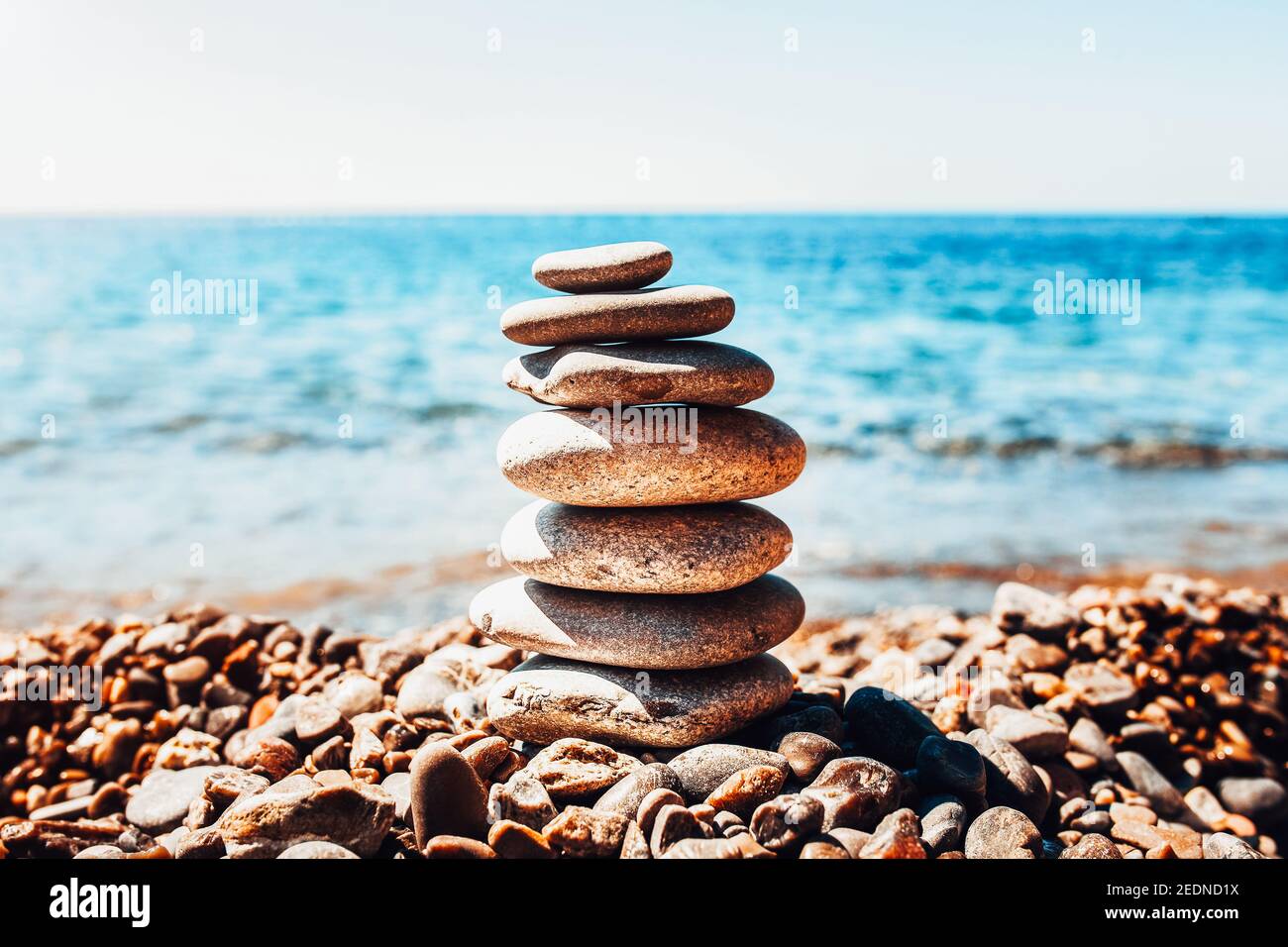 Balancing stones on the beach - oriental medicine - a symbol of ...
