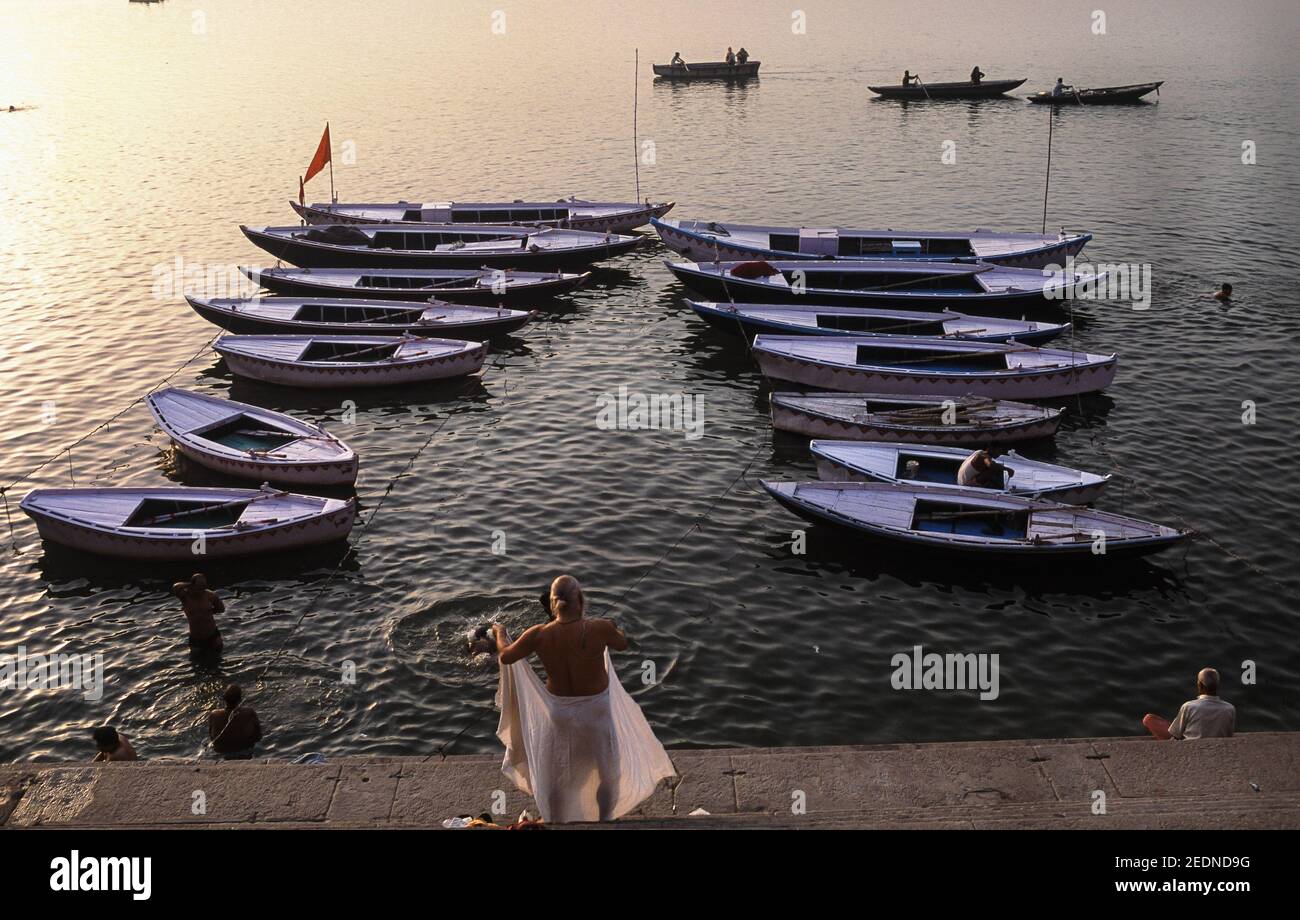 Indian people bathing on a ghat hi-res stock photography and images - Alamy