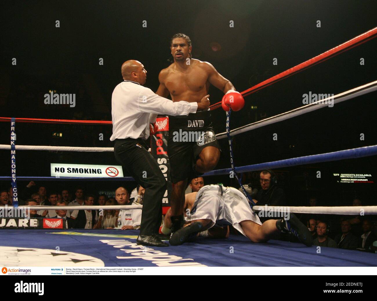 The referee steps in to stop the fight hi-res stock photography and ...