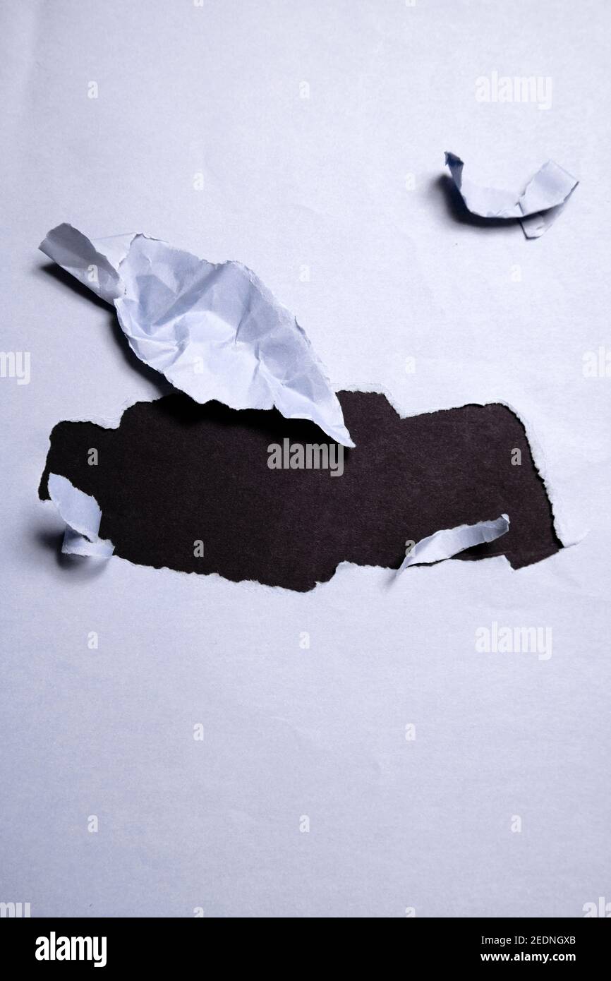 Torn Paper Revealing Hole Stock Photo - Alamy