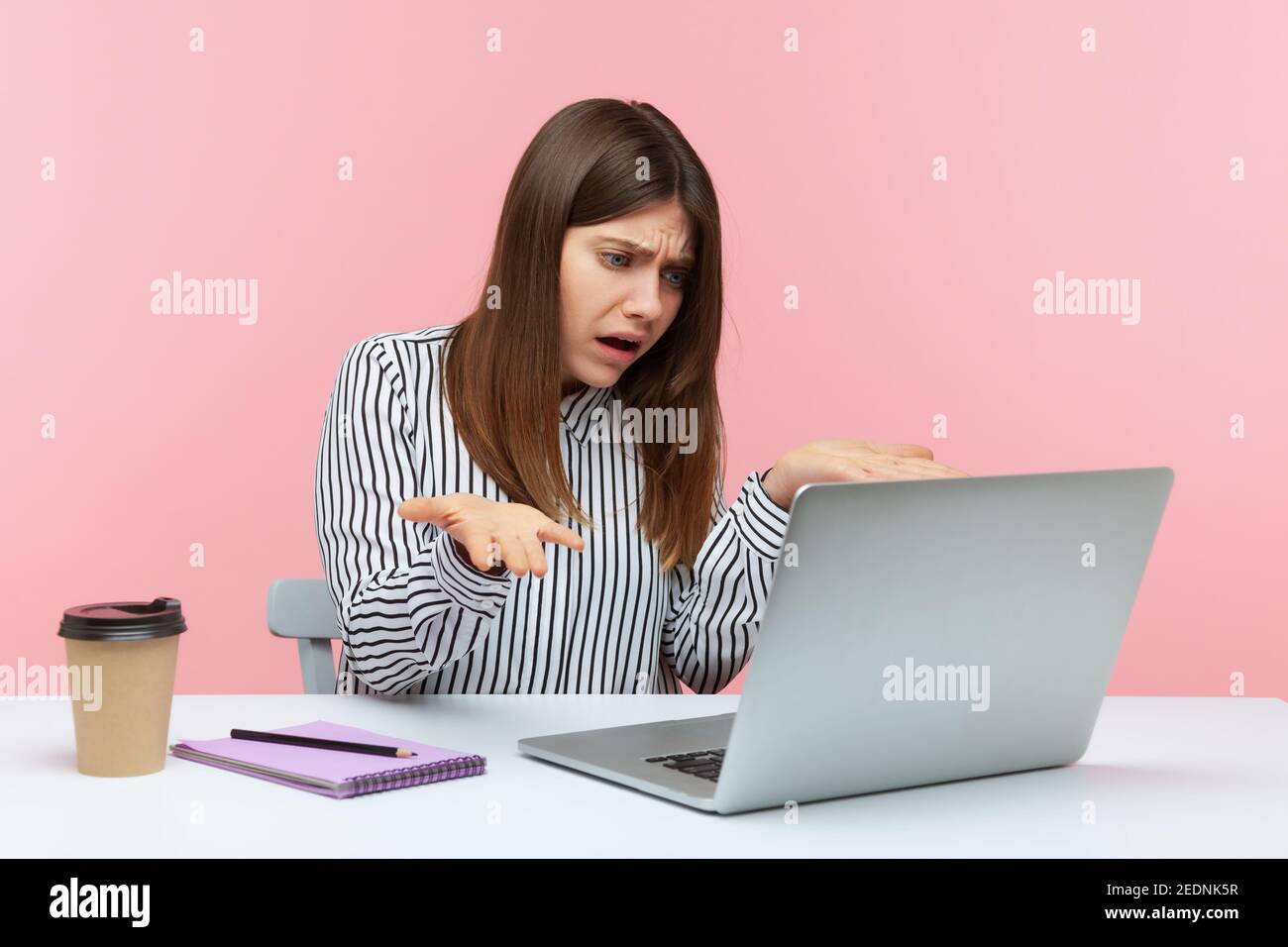What do you want? Nervous angry business woman spreading hands asking ...