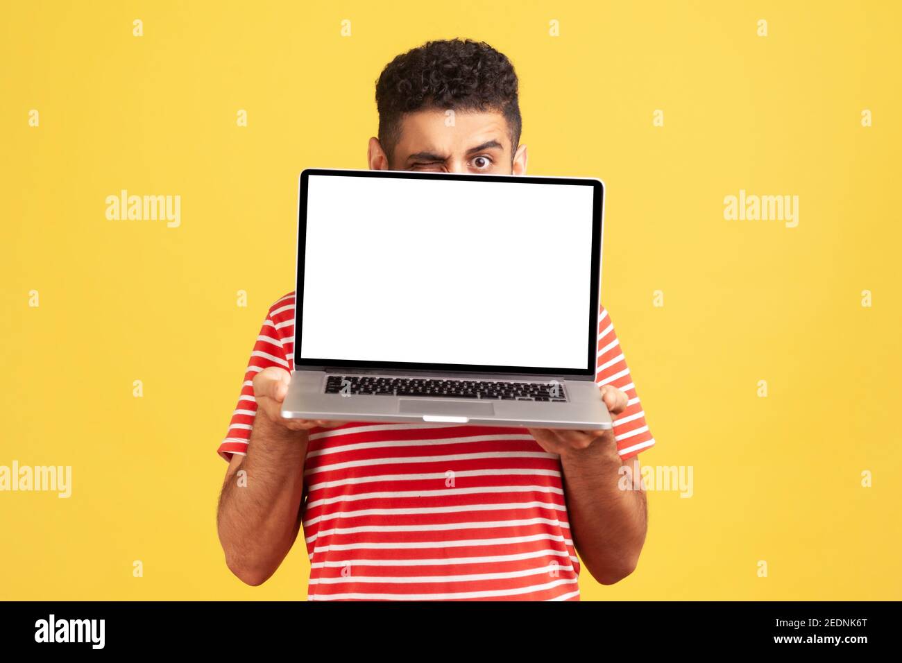 Man hiding behind computer hi-res stock photography and images - Alamy