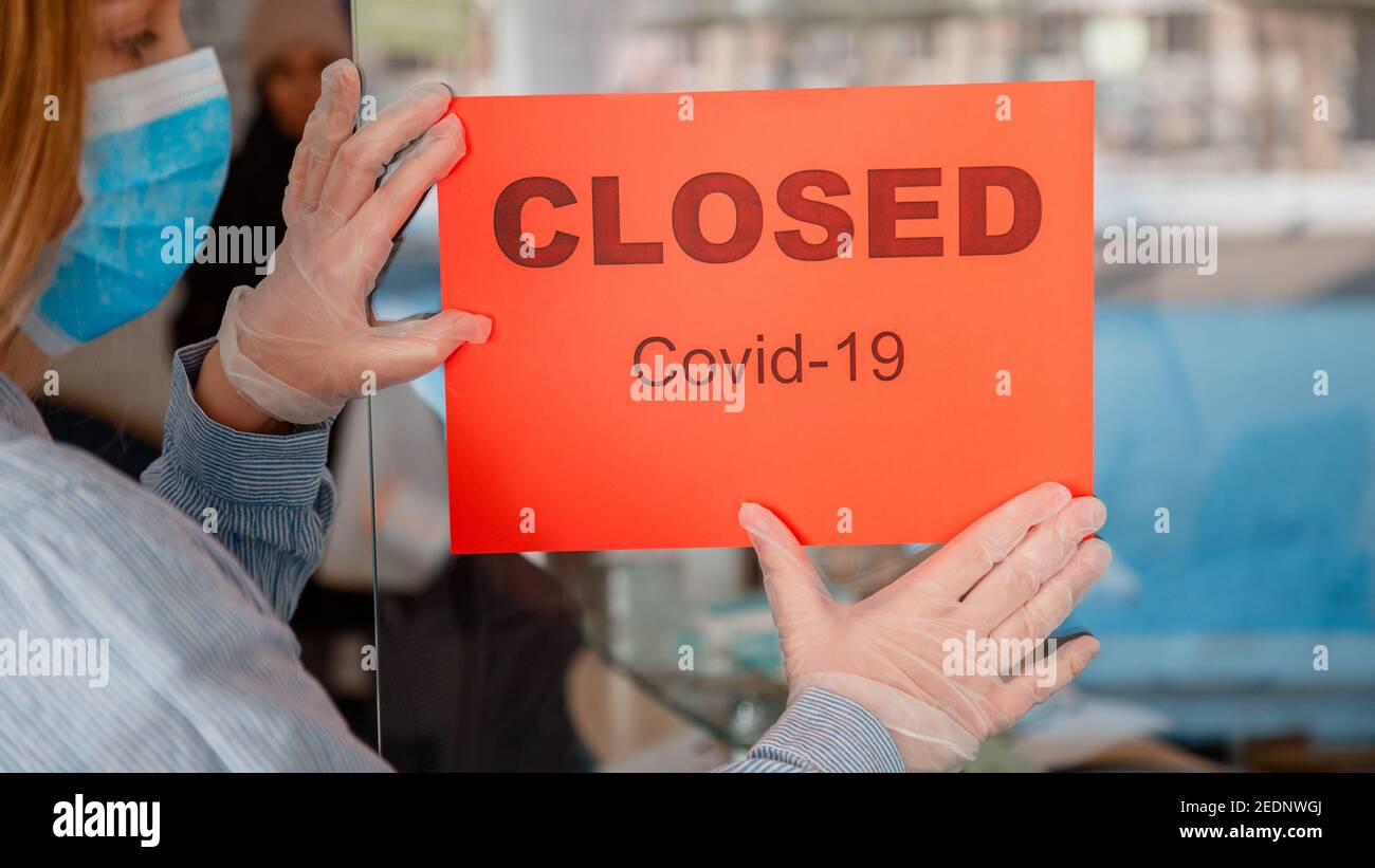 Red Sign Closed covid 19 lockdown on shop front entrance door as new ...
