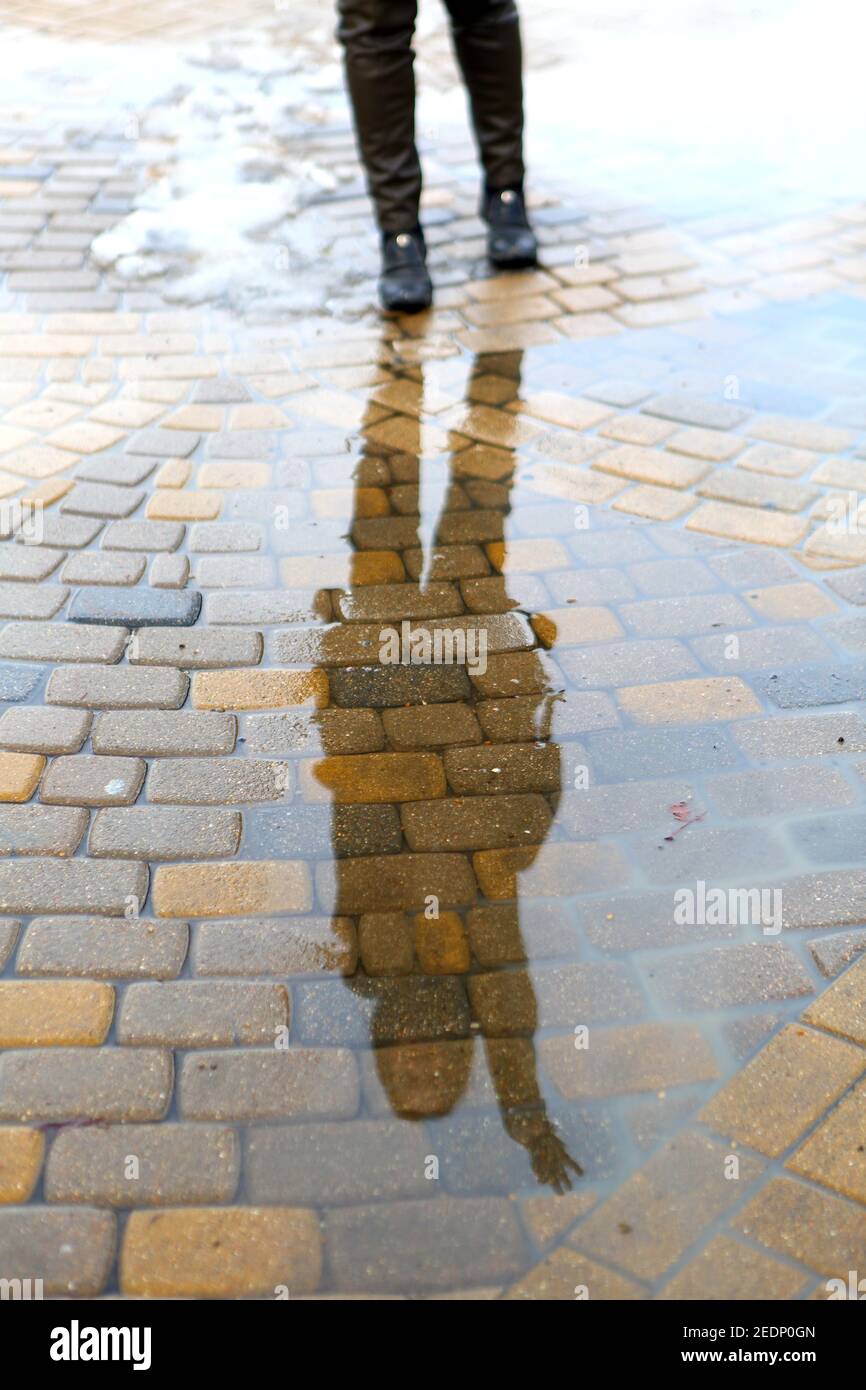 Reflection of a girl in the water Stock Photo - Alamy