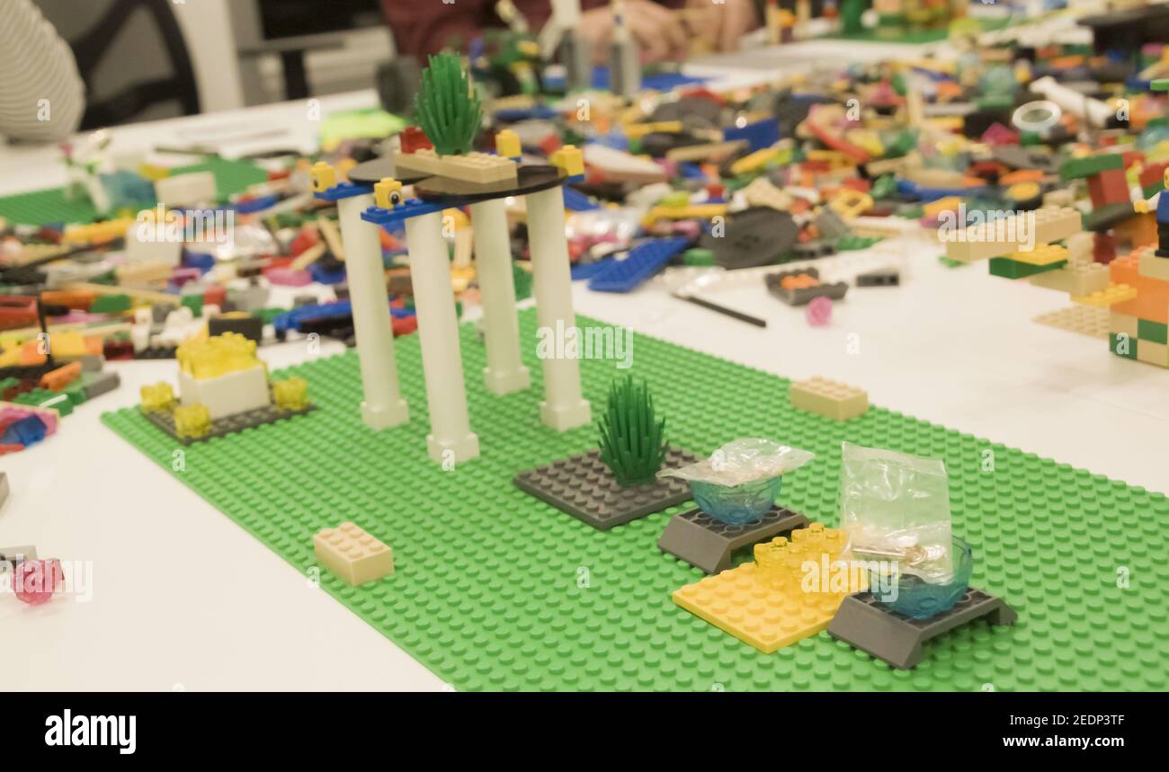 Selective focus shot of interlocking plastic brick toys construction ...