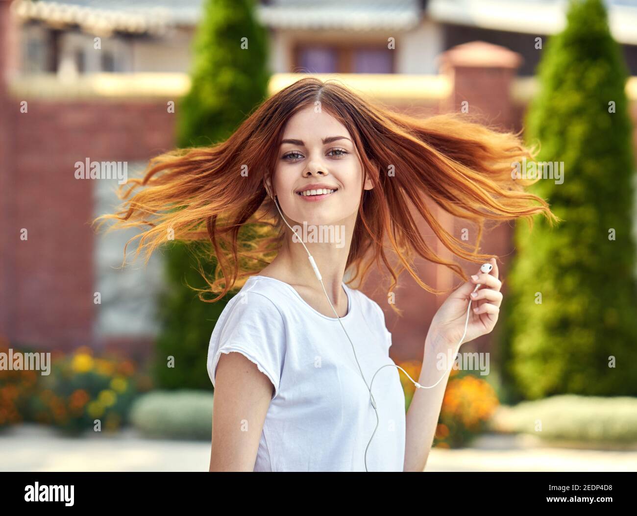 Cheerful teenage woman resting hi-res stock photography and images - Alamy