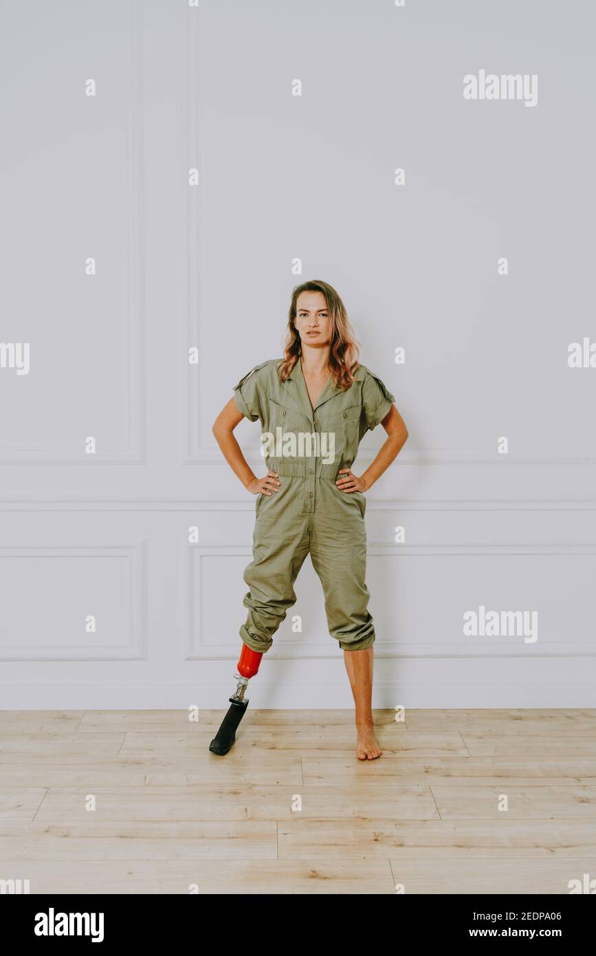 Beautiful young woman with amputation - Pretty and confident woman with ...