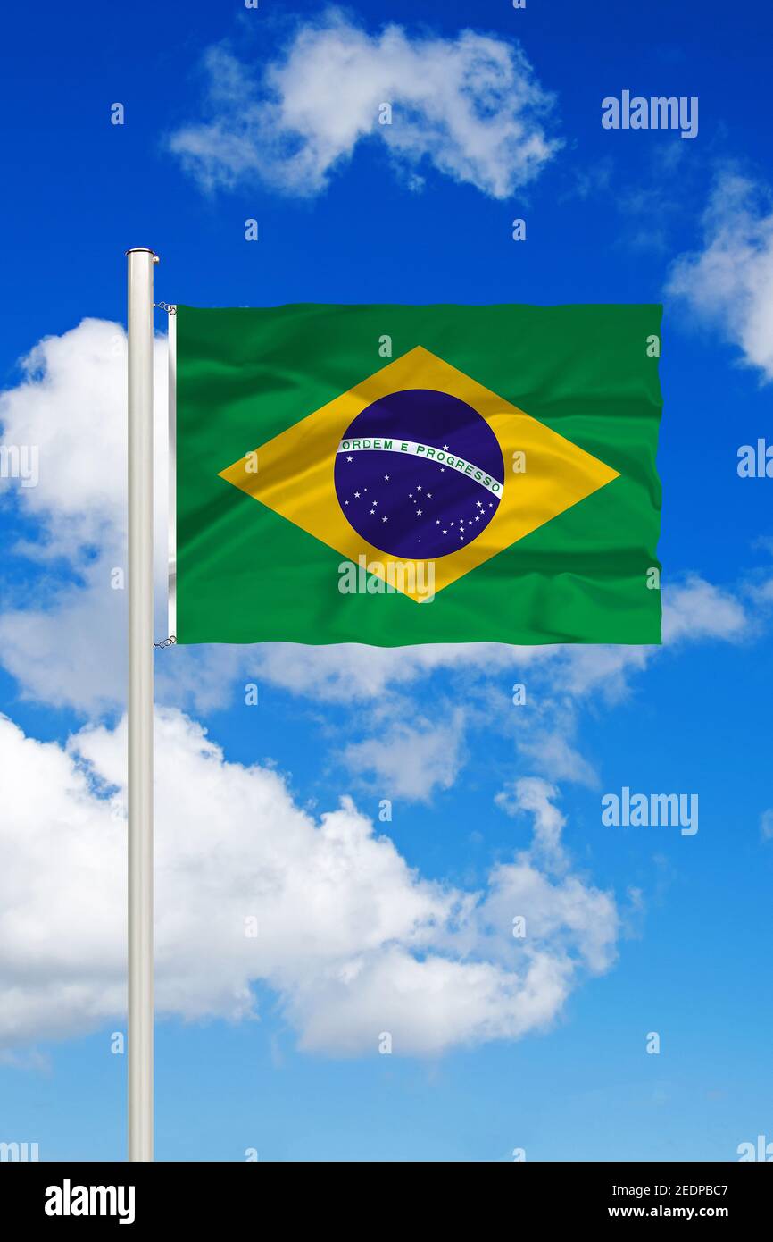 flag of Brazil against blue cloudy sky, Brazil Stock Photo - Alamy