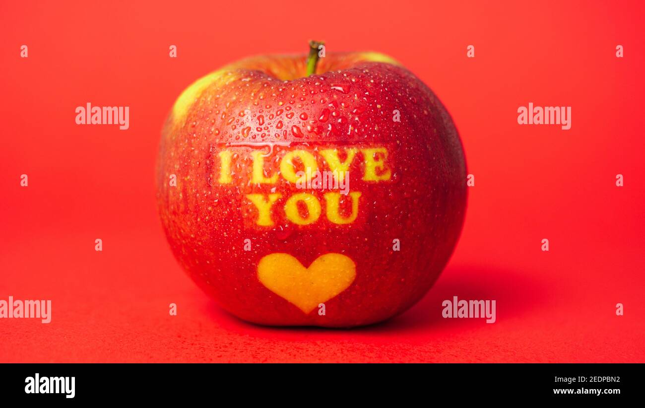 Valentine's Day themed apple with I Love You message and a heart symbol ...