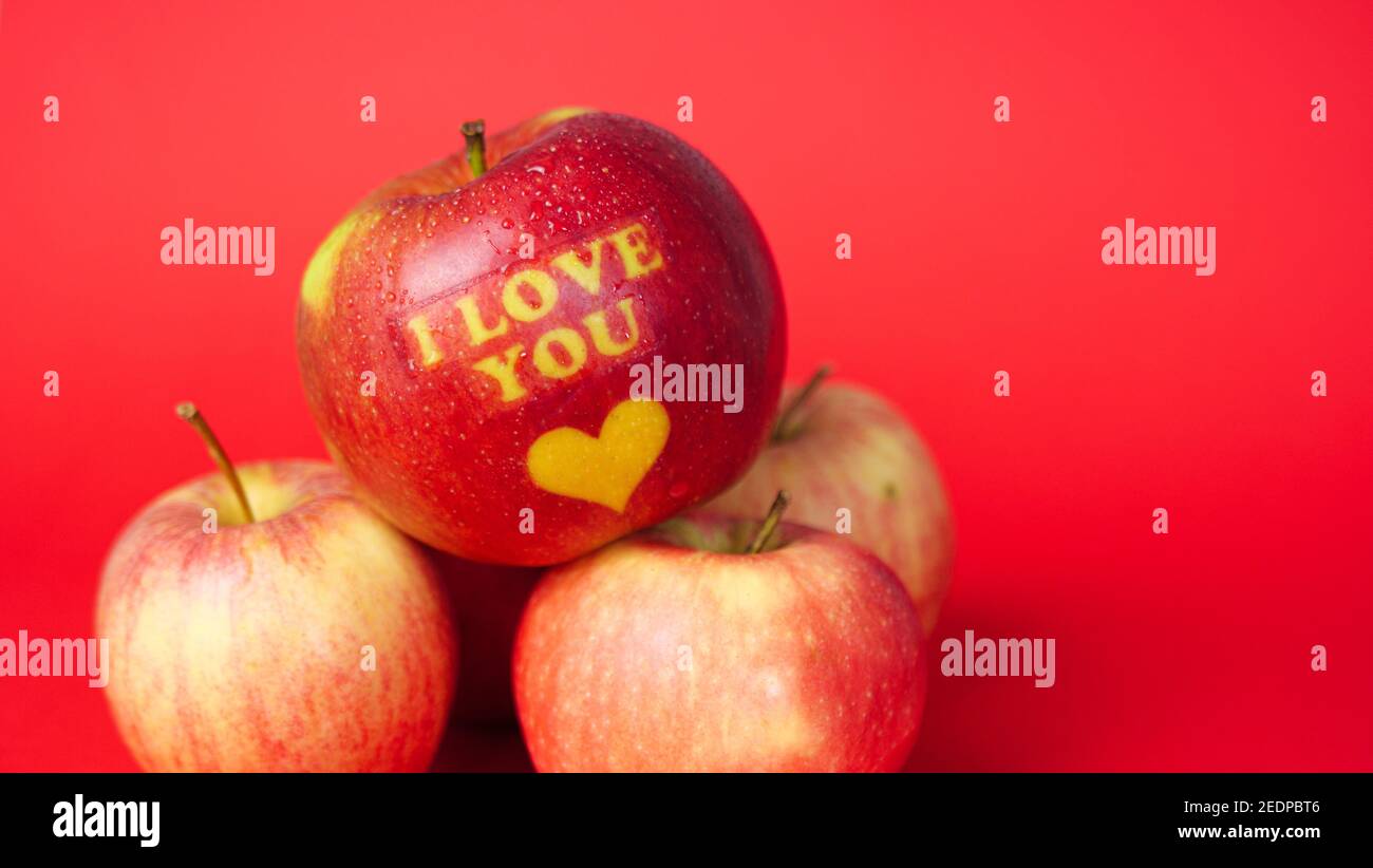 Valentine's Day themed apple with I Love You message and a heart symbol ...
