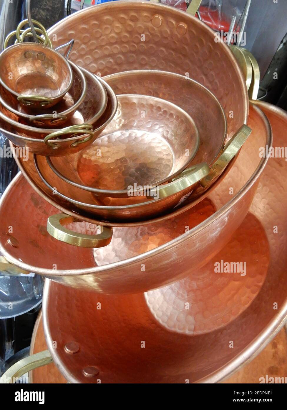 Stacked copper pans Stock Photo - Alamy