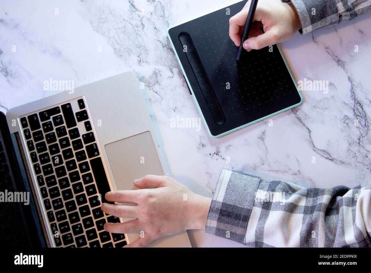 Top view unrecognizable business woman typing on her laptop using her ...