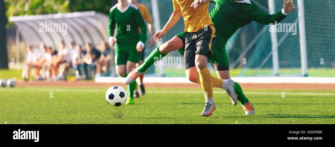 Adult Football Players Compete in Soccer Match. Group of Footballers ...