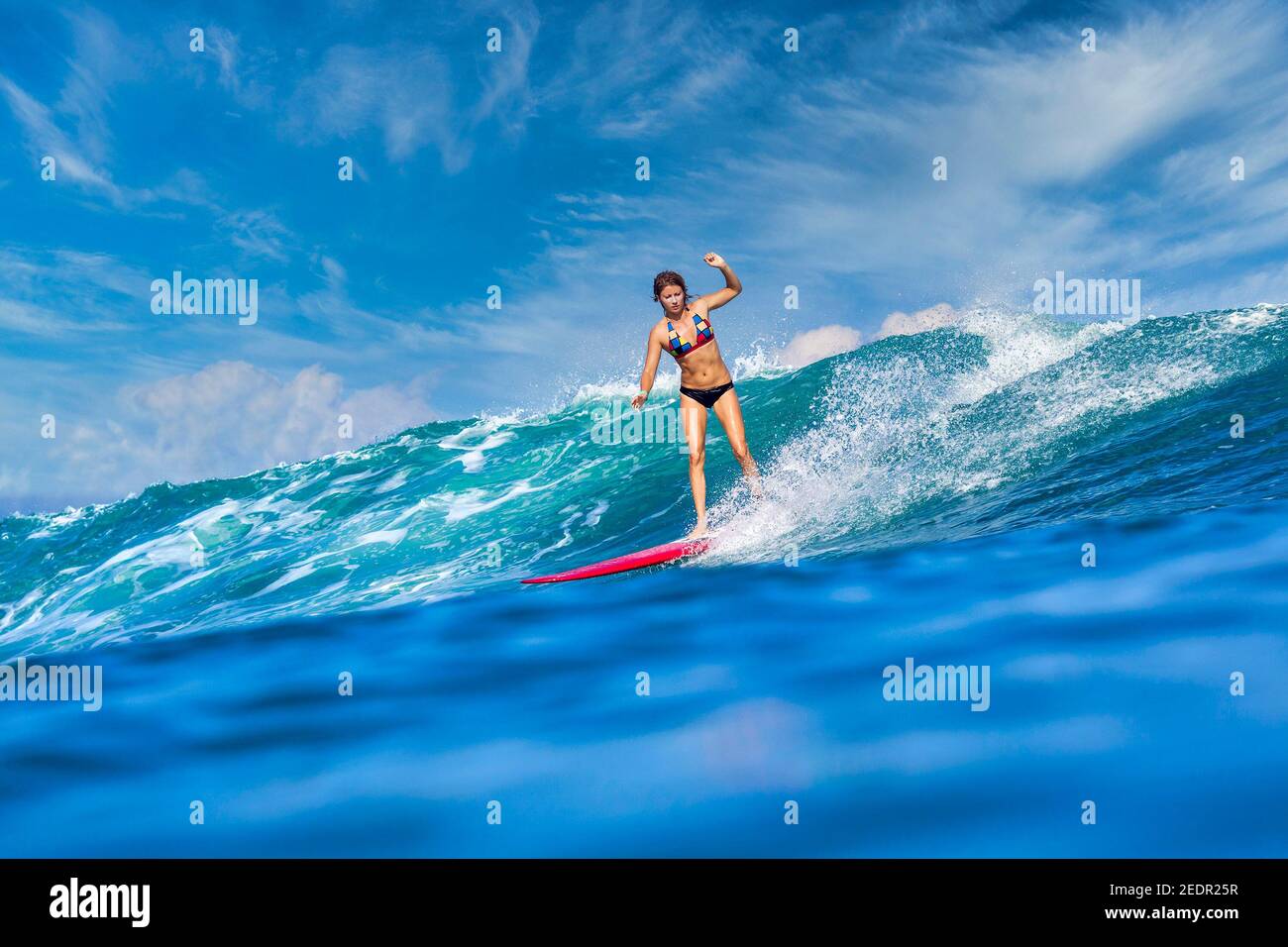 Female surfing action hi-res stock photography and images - Alamy