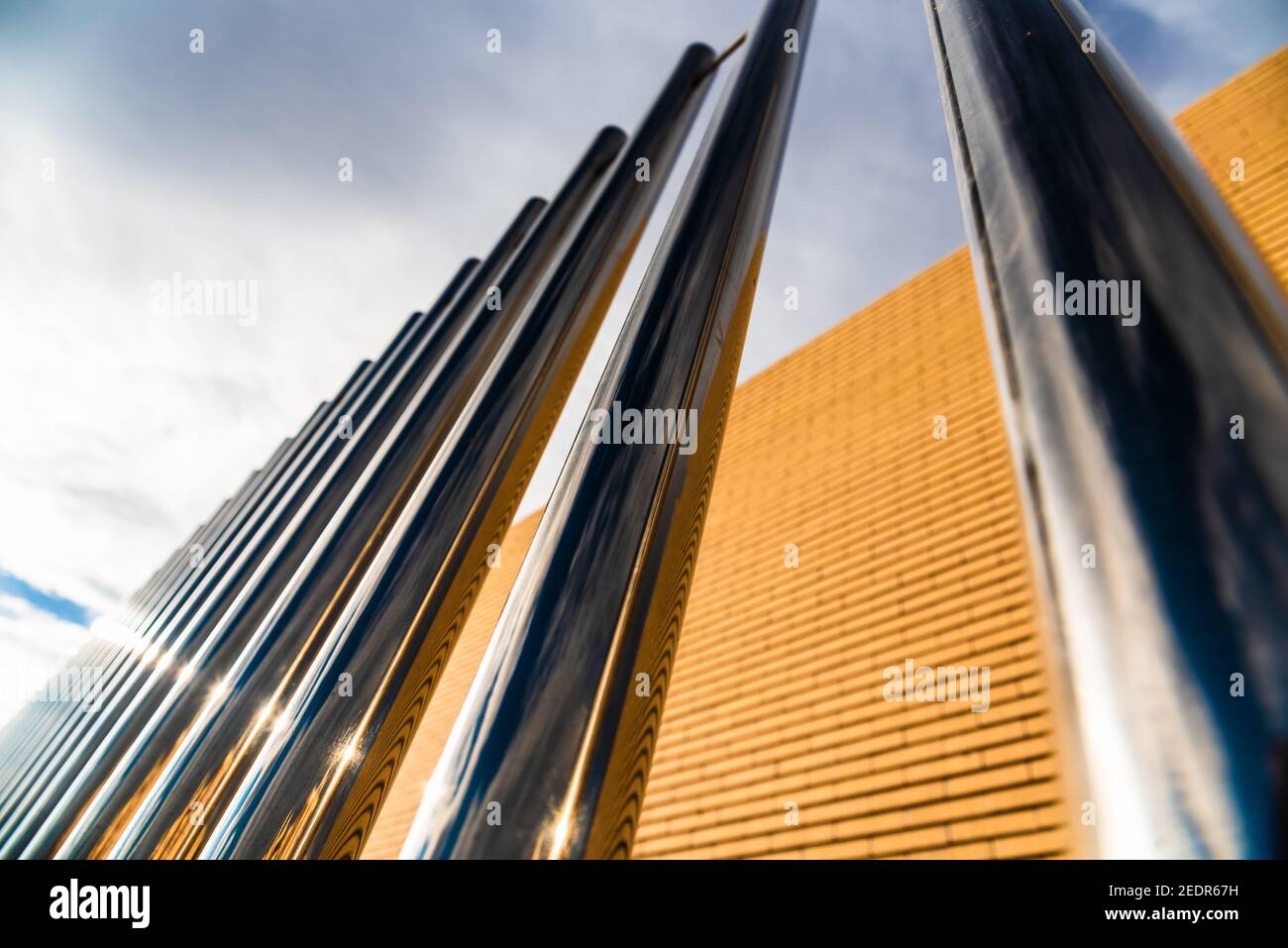 Thick metal bars protect a brick wall building Stock Photo - Alamy