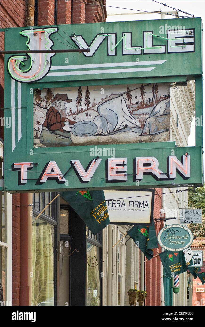 Gold prospector in historic tavern sign at California Street in ...