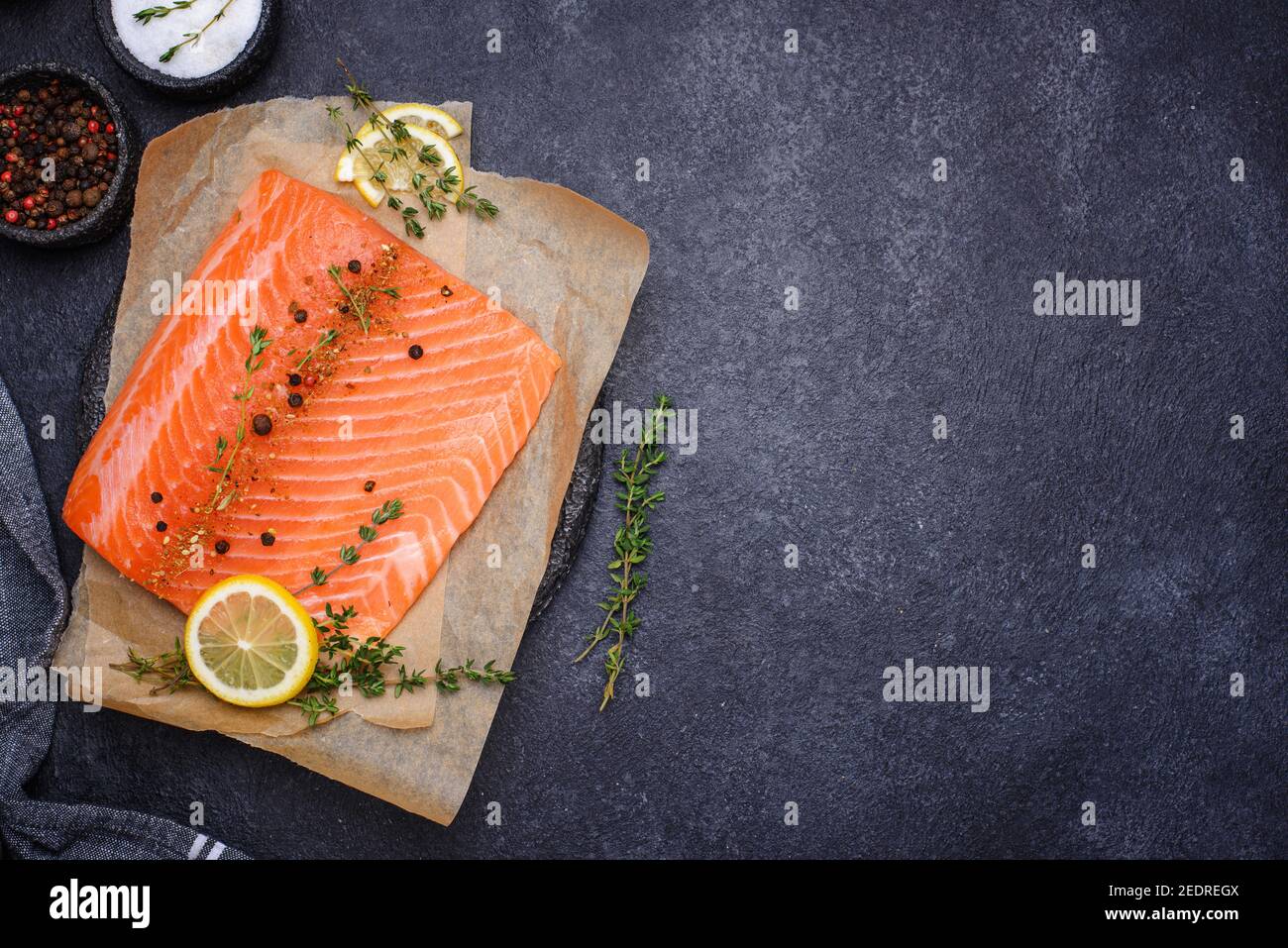 Raw salmon fillet with herbs Stock Photo - Alamy