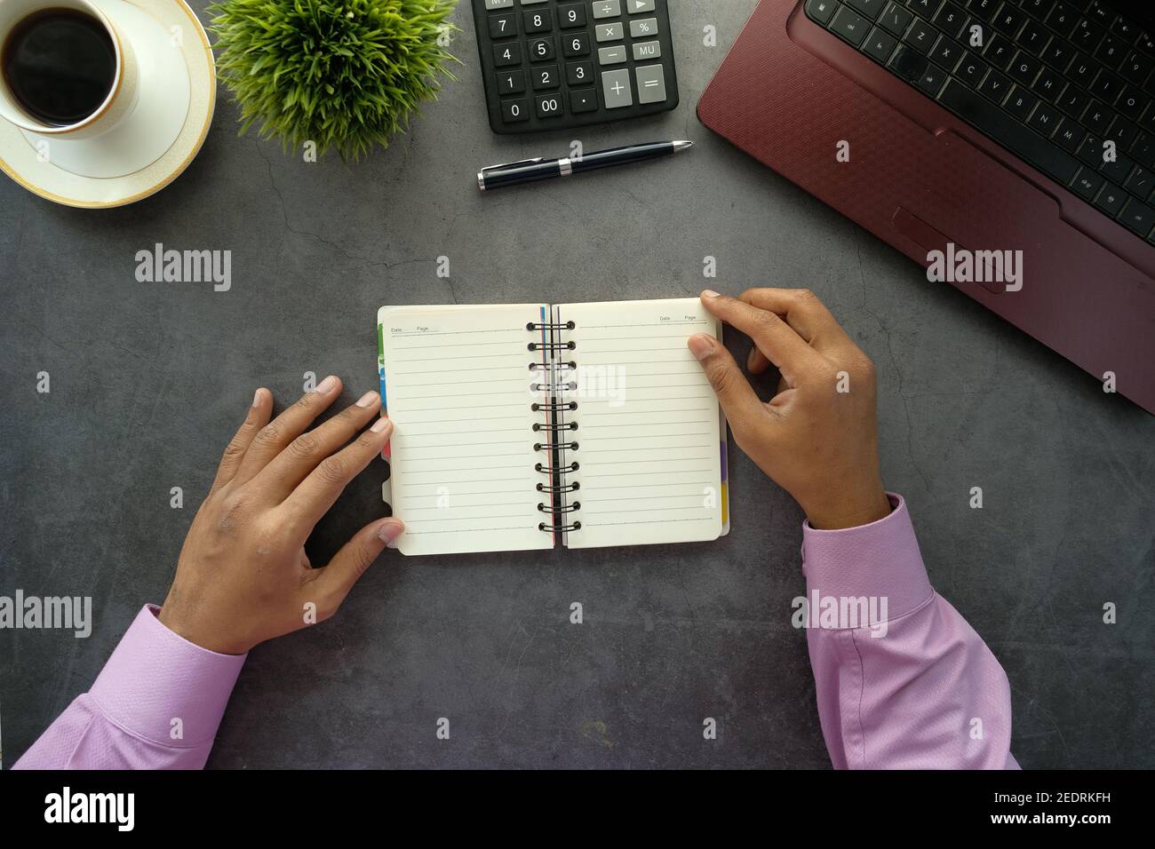 top view of man hand writing on notepad Stock Photo - Alamy