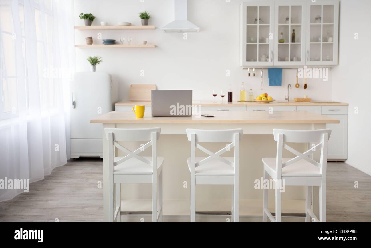 Workspace in kitchen and modern dining room interior Stock Photo - Alamy