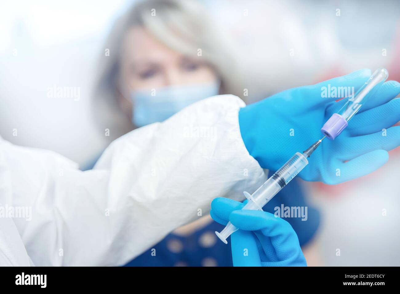 Nurse giving intramuscular injection in hi-res stock photography and ...