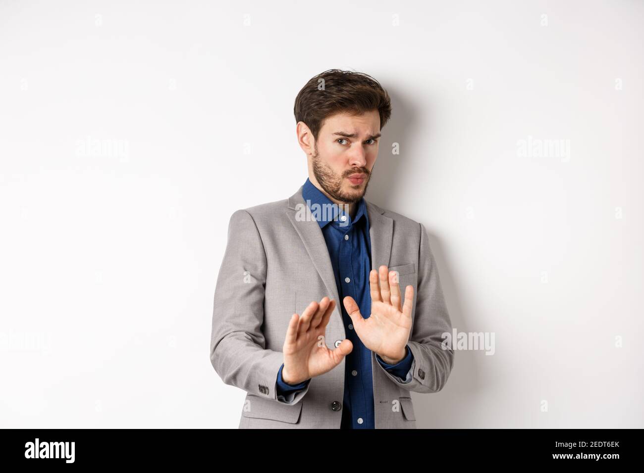 Stay Away Reluctant Businessman Step Back With Concerned Disgusted