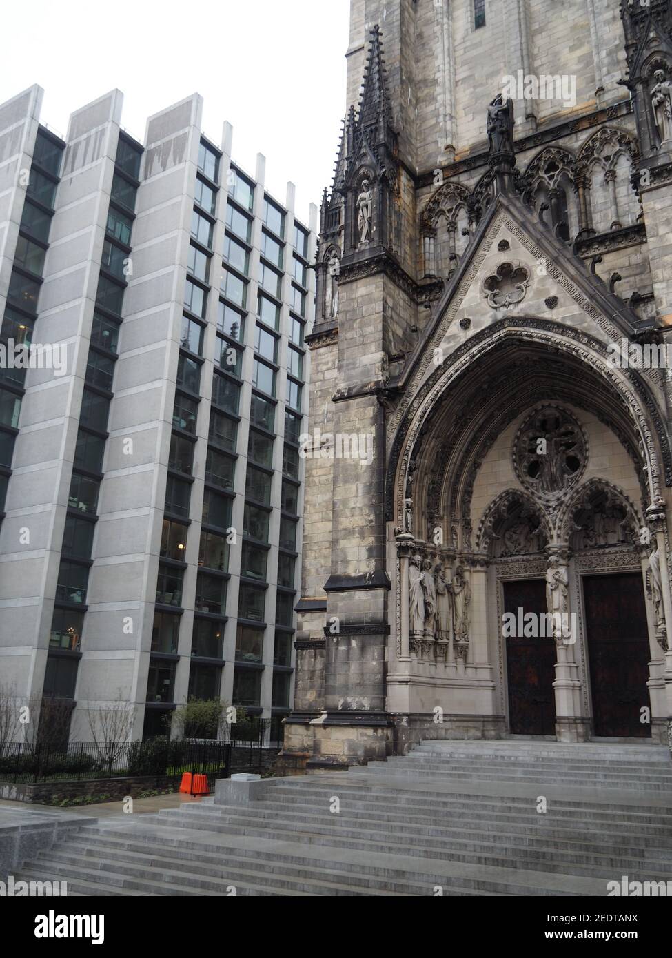 Vertical low angle shot of The Cathedral Church of Saint John the Divine in New York Stock Photo ...