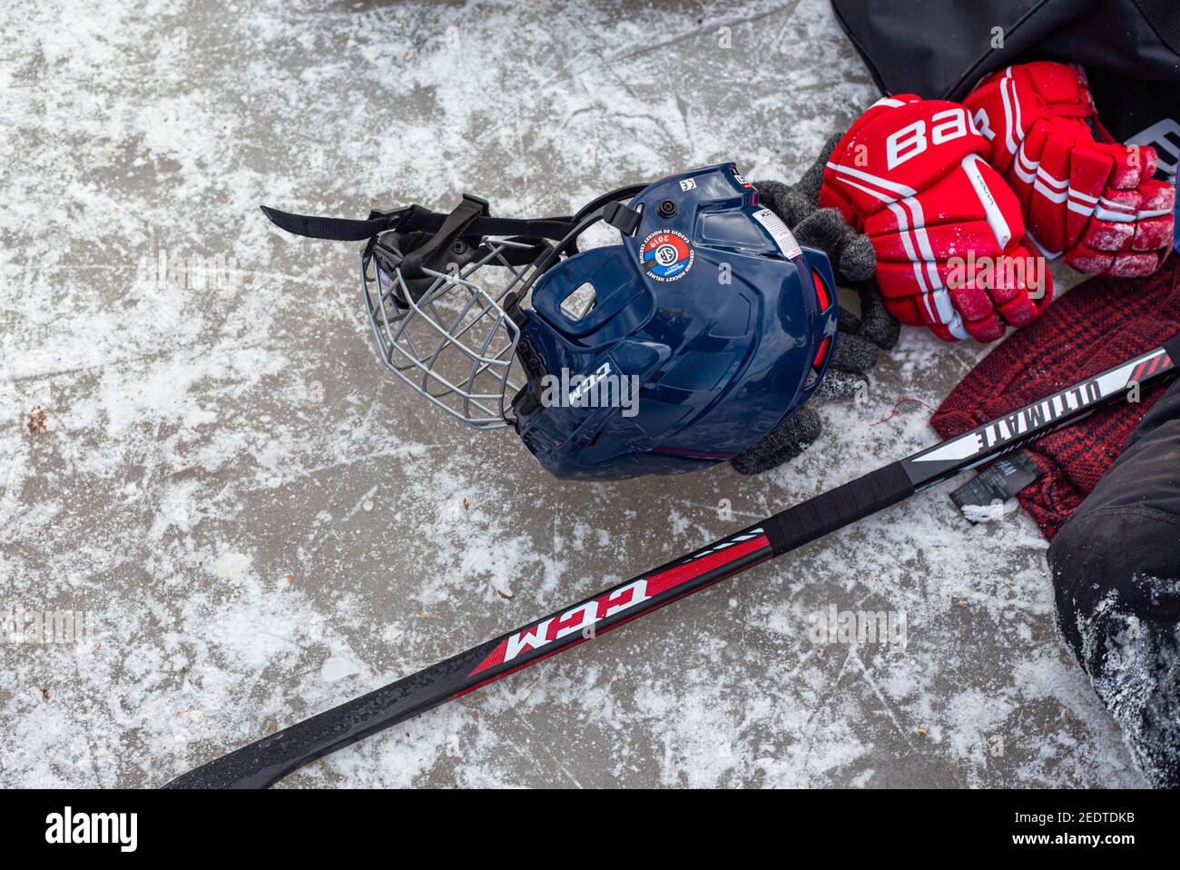 Someone has left their hockey equipment on the ice Stock Photo - Alamy