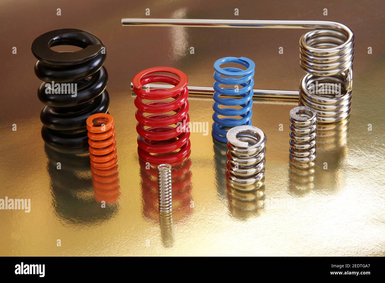 Metal springs in different sizes Stock Photo - Alamy