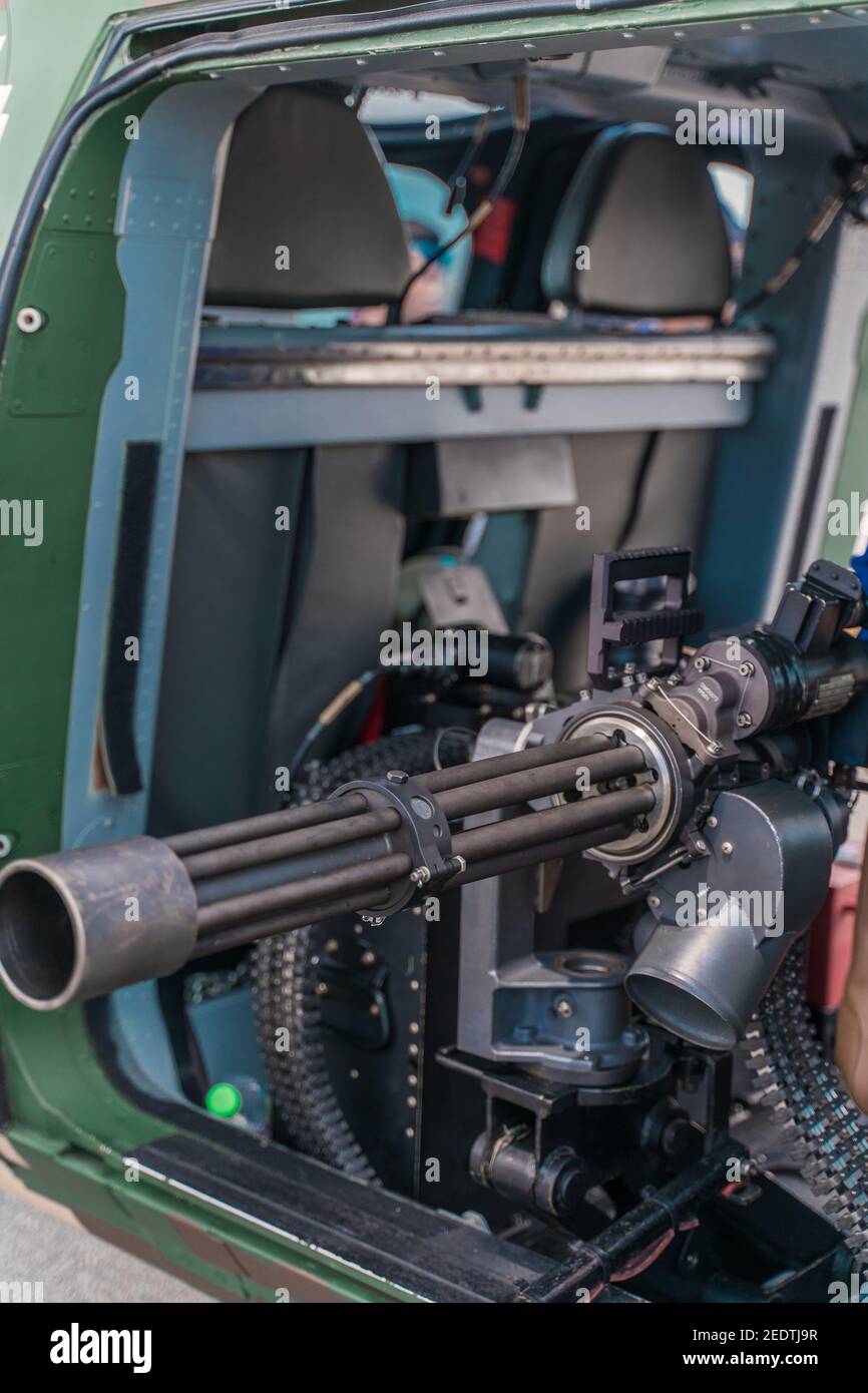 Closeup of a powerful rapid fire heavy machine gun with ammunition ...